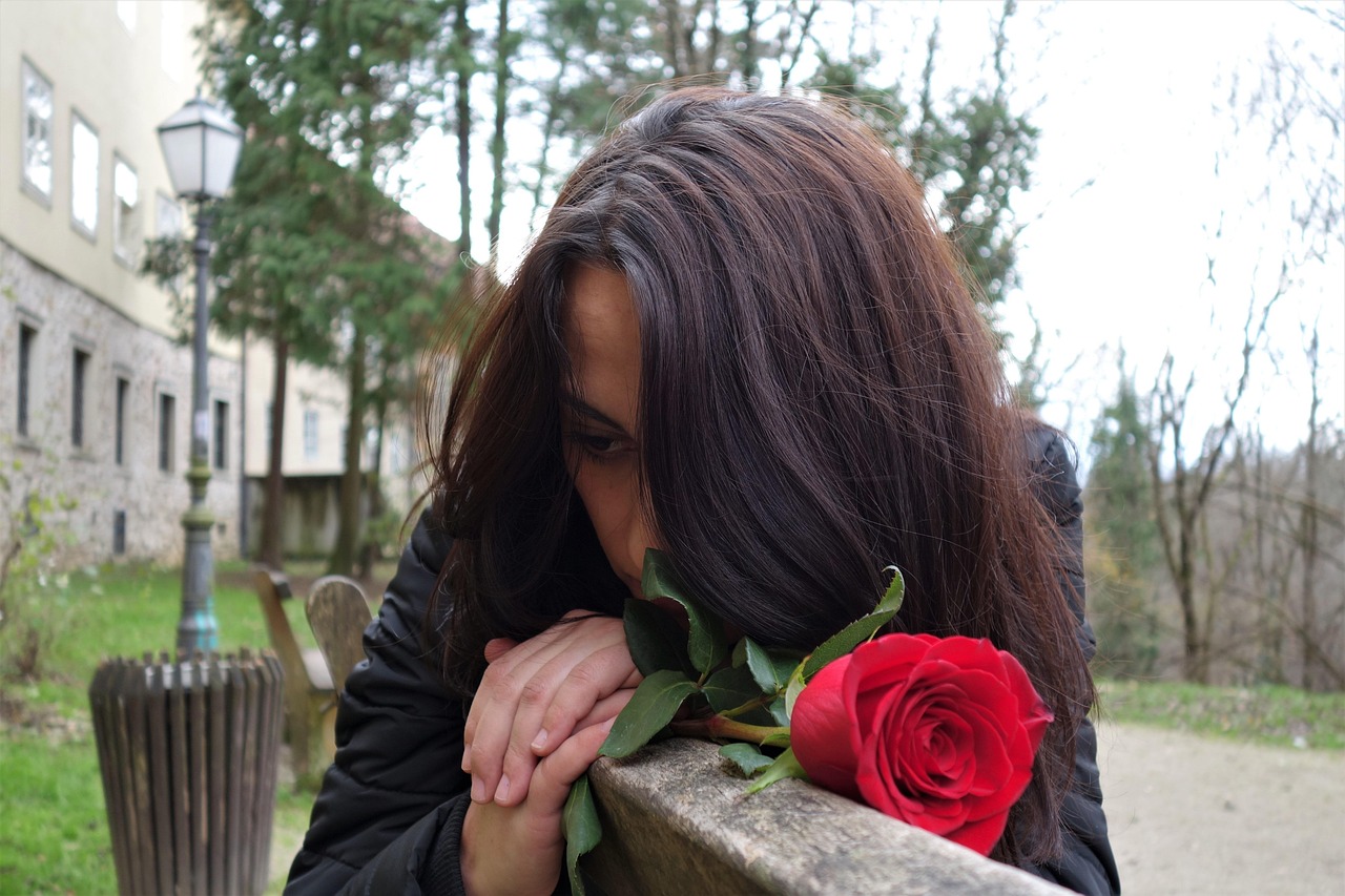 Sad Girl With Red Rose Wallpaper