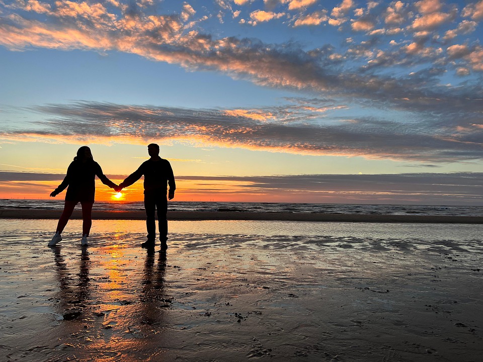Sonnenuntergang Paar Strand